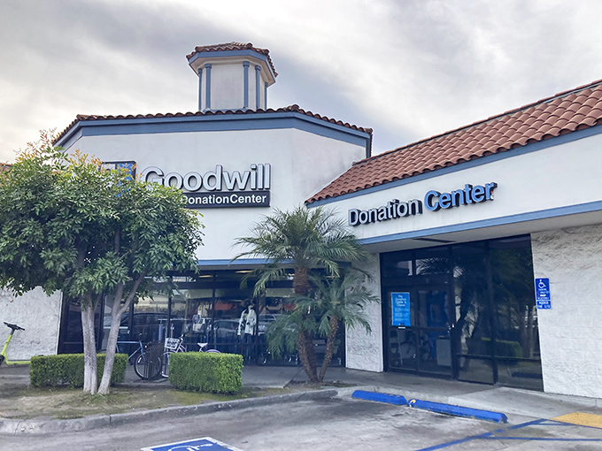 The Spanish-style architecture of this Goodwill location feels distinctly SoCal—like a bargain hunter's hacienda where treasure awaits behind those blue-trimmed doors.