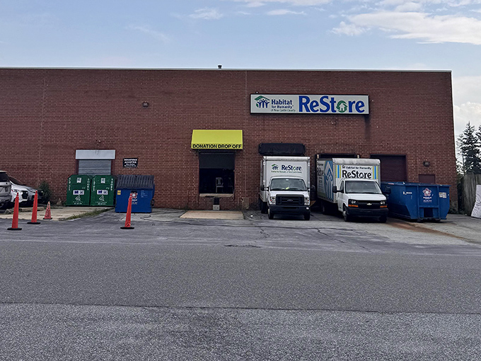 The unassuming brick exterior of Prices Corner ReStore hides a wonderland of bargains inside, like finding the secret entrance to Narnia through a thrift store wardrobe.