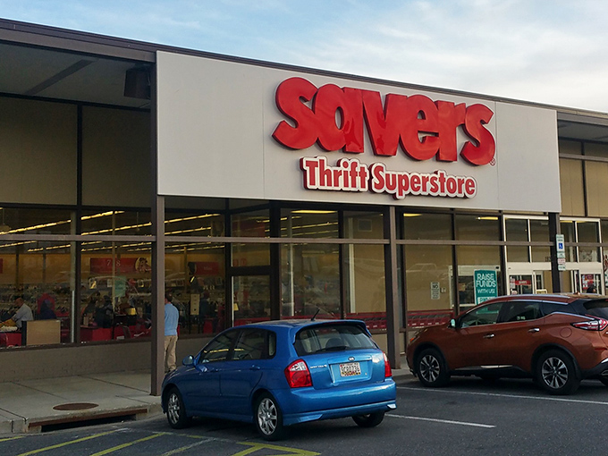 The iconic red Savers sign beckons bargain hunters like a retail lighthouse, promising treasures within that could turn anyone into a thrift store convert.