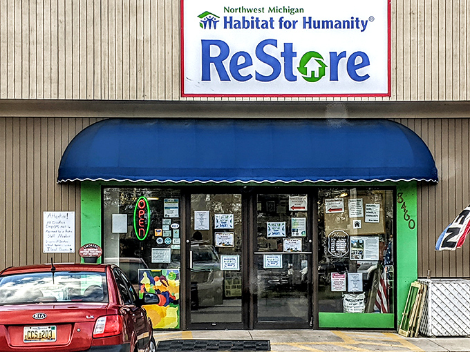 The blue awning and green-framed entrance beckon bargain hunters like a siren song for the fiscally responsible. Welcome to treasure island!