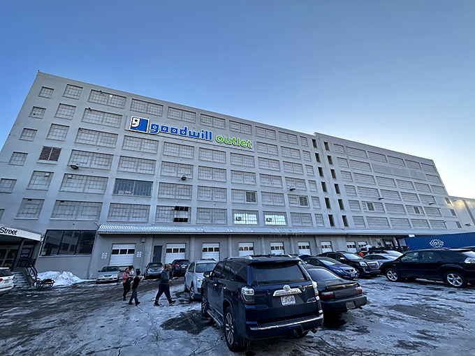 The unassuming exterior of MERS Goodwill Outlet on Market Street hides a treasure hunter's paradise within. The line of eager shoppers gives away the secret.