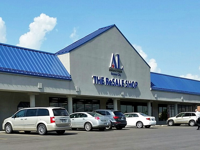 The iconic blue roof of THE ReSALE SHOP beckons bargain hunters like a retail lighthouse guiding ships to treasure-filled shores.