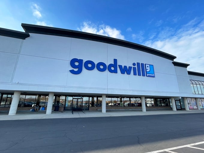 From the parking lot, you can almost hear the siren call of secondhand deals waiting to be discovered inside.