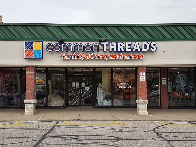 The unassuming storefront of Common Threads belies the treasure trove within. Like finding a secret portal to bargain paradise!
