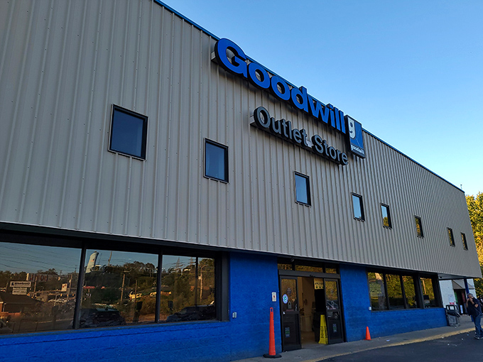Bright blue accents welcome shoppers to this thrifting paradise where one person's castoffs become another's prized discoveries.