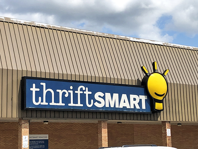 The unassuming exterior of ThriftSmart belies the treasure trove within. That cheerful lightbulb logo promises bright ideas for your wallet and your wardrobe.