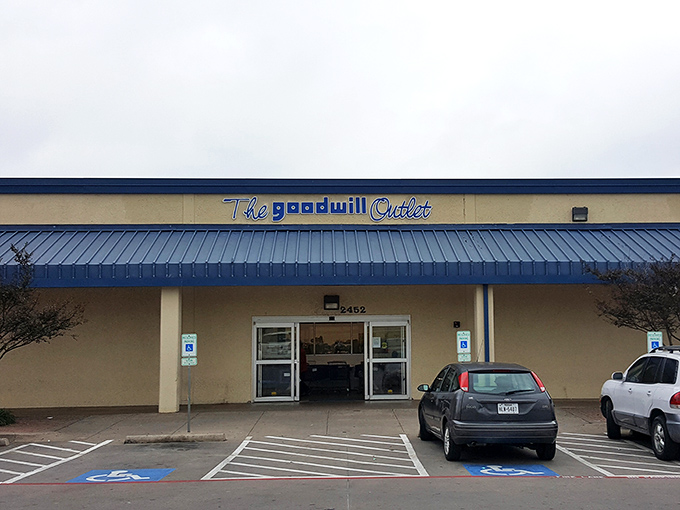 Parked cars hint at the treasures within. The modest entrance belies the archaeological expedition that awaits inside, where everyday items become extraordinary finds.