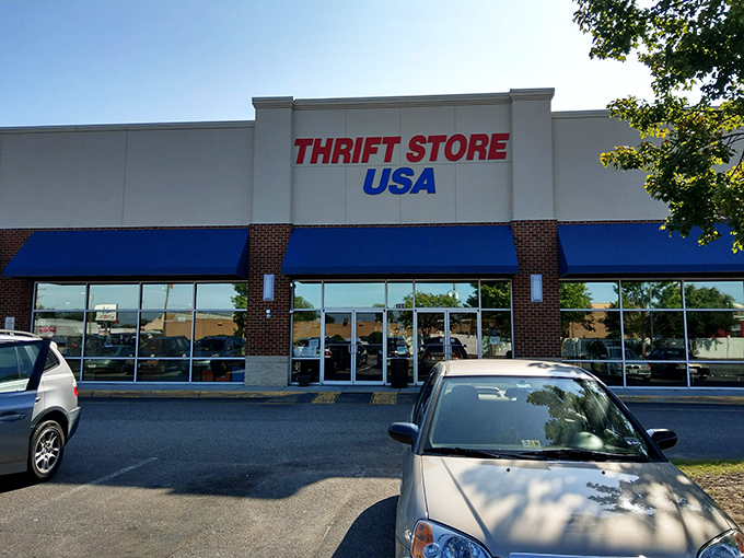 The red and blue signage beckons like a patriotic bat signal for bargain hunters. Welcome to the mothership of secondhand treasures in Norfolk!