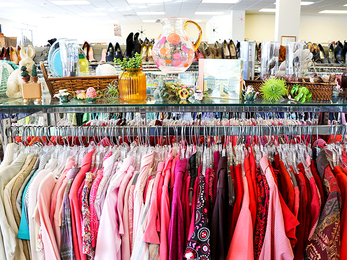 The fashion section at Agrace Thrift Store showcases carefully curated clothing displays that would make Marie Kondo nod in approval.