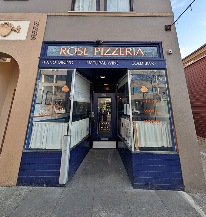 The unassuming blue storefront of Rose Pizzeria beckons like a secret handshake among pizza aficionados. Berkeley's hidden gem awaits.