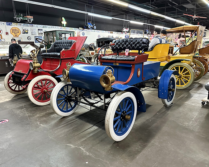 The entrance to Miles Through Time Automotive Museum beckons car enthusiasts with vintage beauties flanking the doorway—automotive appetizers before the main course inside.