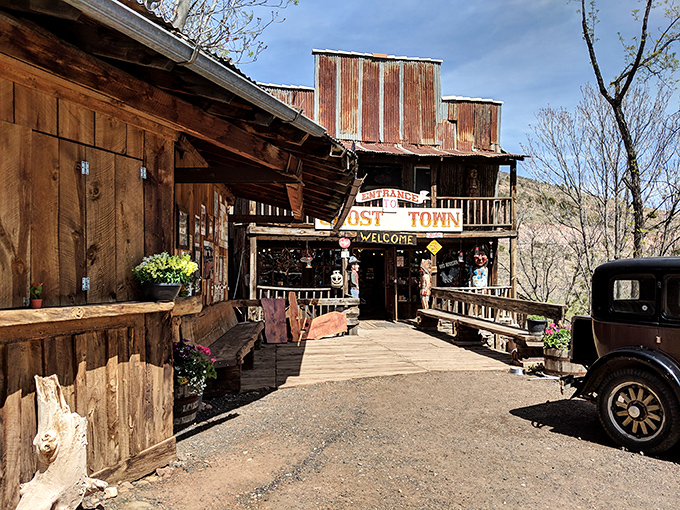 Jerome clings to Cleopatra Hill like a colorful barnacle on the hull of Arizona's history, its buildings seemingly defying both gravity and time.