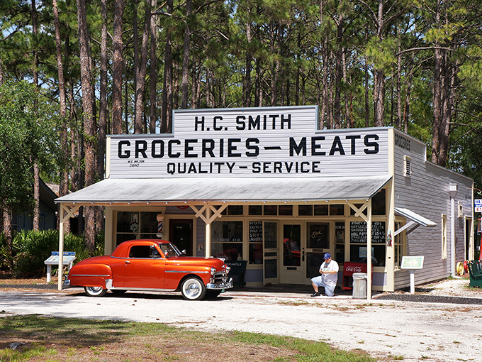 The H.C. Smith Groceries & Meats store stands frozen in time, complete with a vintage car that makes you wonder if the owner just stepped inside for a loaf of bread.