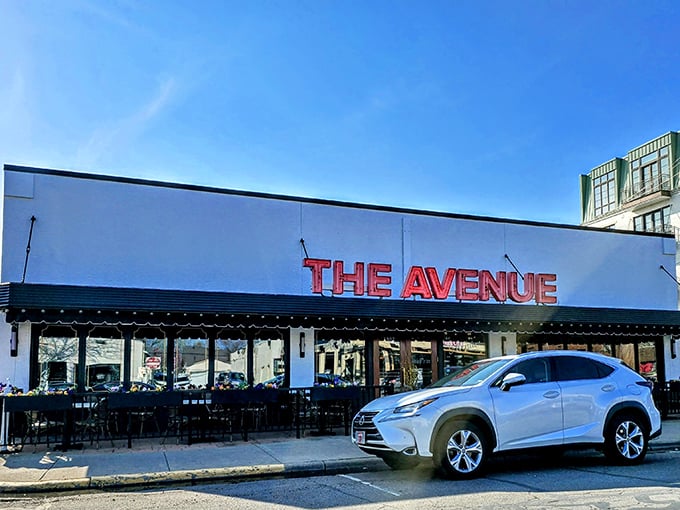 The bold red signage of The Avenue beckons like a lighthouse for the hungry, promising refuge from mediocre meals in Columbus's dining landscape.