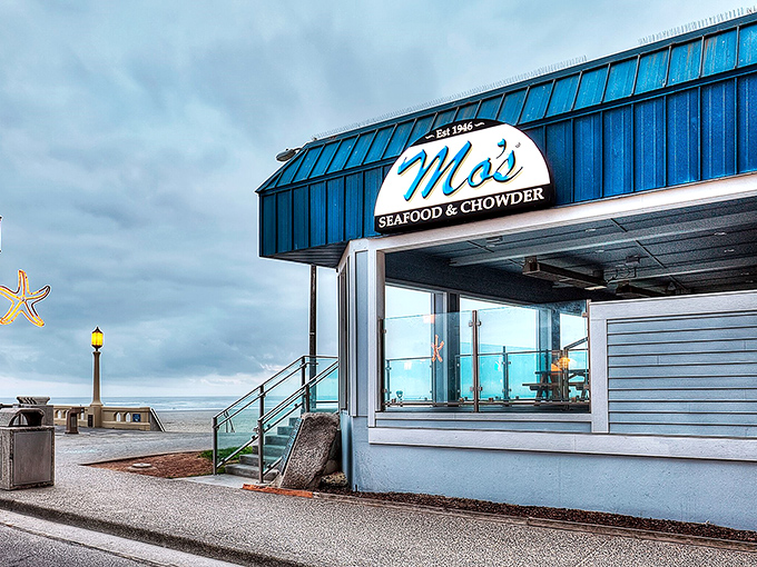 The iconic blue exterior of Mo's beckons seafood lovers like a maritime lighthouse, promising ocean-fresh delights with a side of Pacific views.