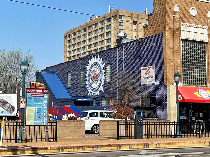 The iconic blue brick exterior of Fitz's with its sunburst logo announces itself like a fizzy beacon in St. Louis's Delmar Loop neighborhood.