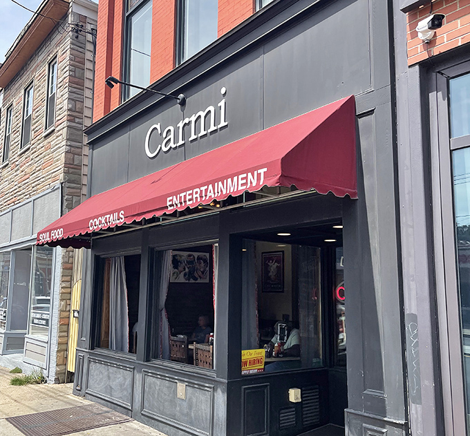 The iconic red awning of Carmi Soul Food Express beckons hungry Pittsburghers like a Southern lighthouse in the Steel City's culinary landscape.