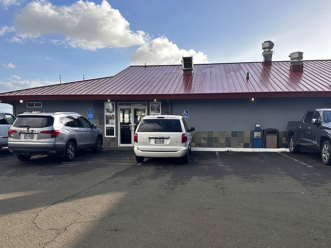 The unassuming exterior with its distinctive red roof houses culinary treasures that locals have been keeping secret from tourists for too long.