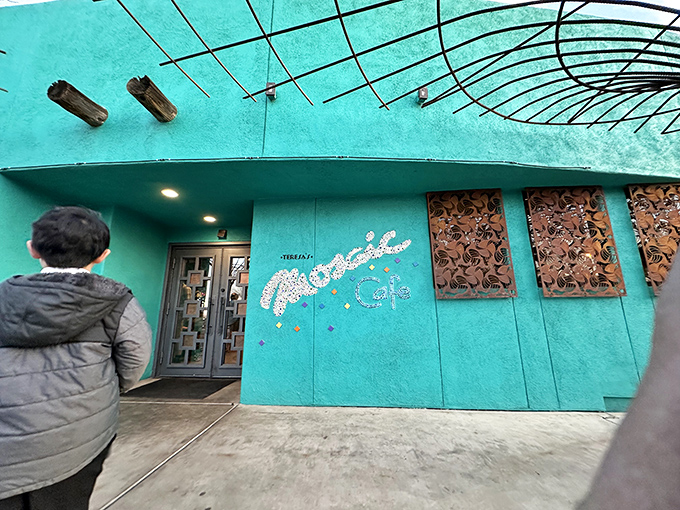 That turquoise exterior isn't just a building&mdash;it's a promise of the vibrant flavors waiting inside Teresa's Mosaic Cafe. The architectural equivalent of a dinner bell.