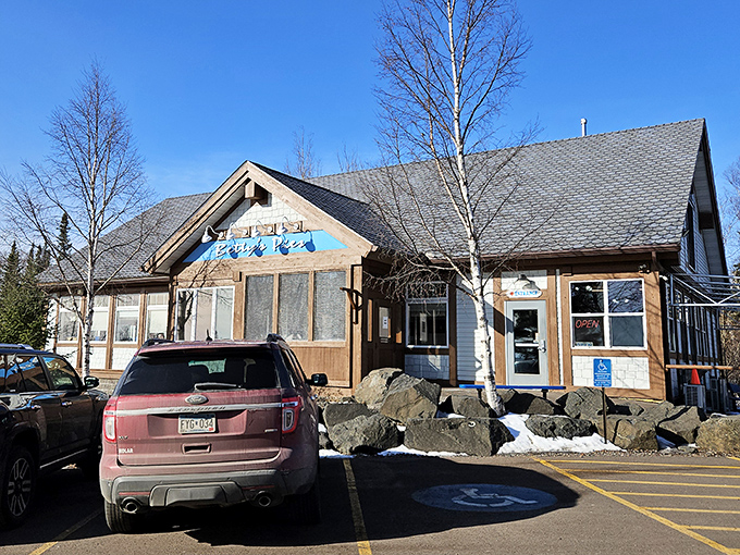 The North Shore's pie paradise stands proudly against Minnesota's big sky, welcoming hungry travelers with its rustic charm and blue signage.
