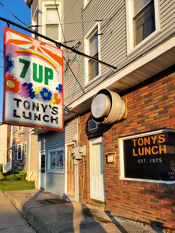 The vintage 7UP sign glows like a beacon of burger hope on this unassuming Girardville street corner. Culinary treasures often hide in plain sight.