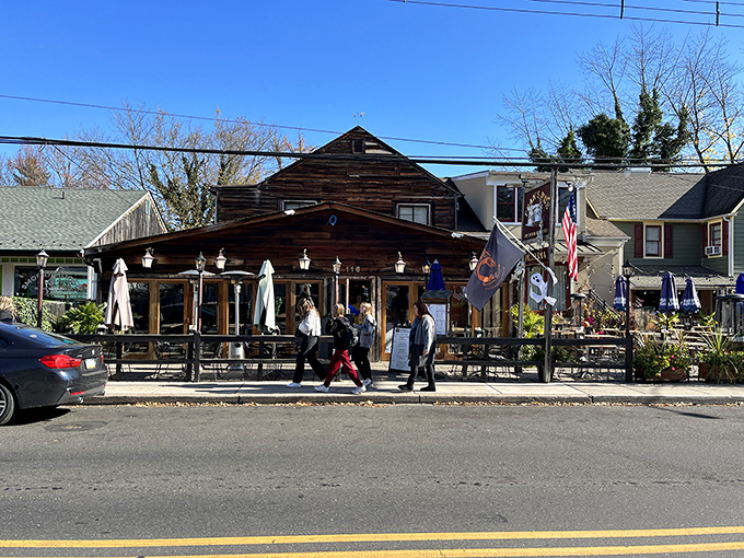 Rustic wooden charm meets small-town hospitality. The weathered exterior of Fran's Pub has welcomed New Hope visitors for generations.