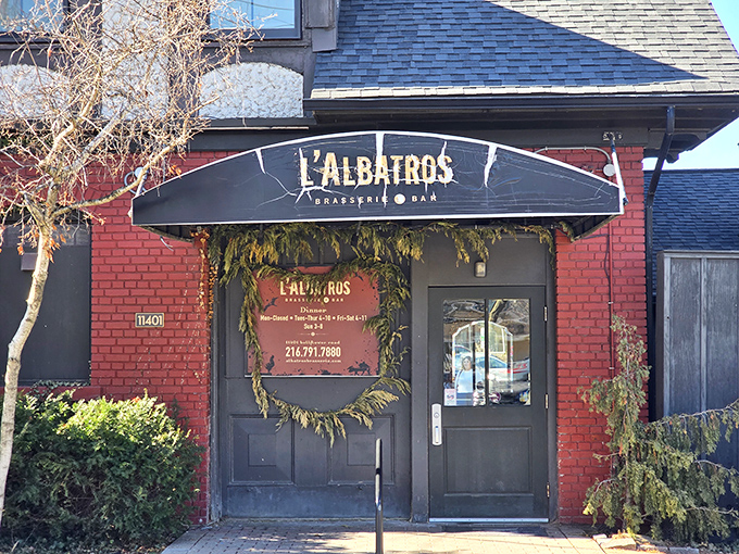 L'Albatros's charming red brick exterior feels like discovering a secret Parisian bistro tucked away in Cleveland's University Circle neighborhood.