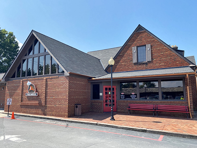 The brick exterior of The Firehouse beckons like a siren call to BBQ lovers, complete with that iconic red door promising smoky treasures within.