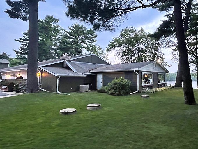 Nestled among towering pines with a view of Half Moon Lake, the Pinewood's unassuming exterior hides culinary treasures within. Wisconsin's best-kept secret awaits.