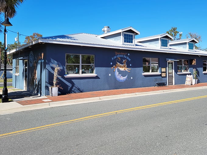 The blue exterior of Kane's Cattle Co. stands out against Crystal River's landscape like a beacon for hungry travelers seeking beef nirvana.