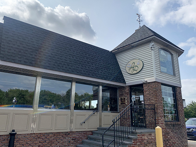 That turret entrance isn't just architectural flair—it's a lighthouse guiding hungry souls to the promised land of perfectly toasted club sandwiches.