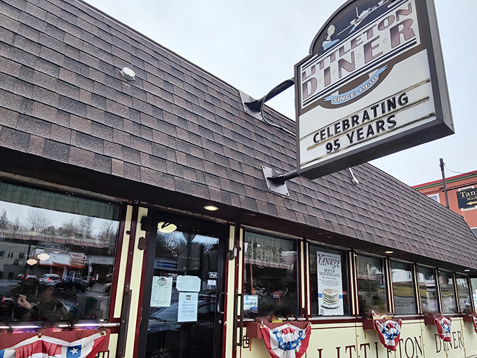 The sign says "Celebrating 95 Years," but the patriotic bunting whispers "We've been making breakfast great since before it was cool."