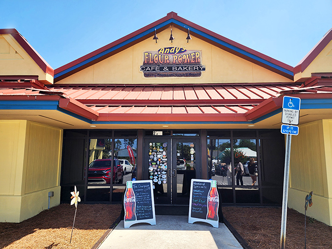 The cheerful yellow exterior with its distinctive red roof promises culinary magic before you even step inside. Florida sunshine meets breakfast paradise.