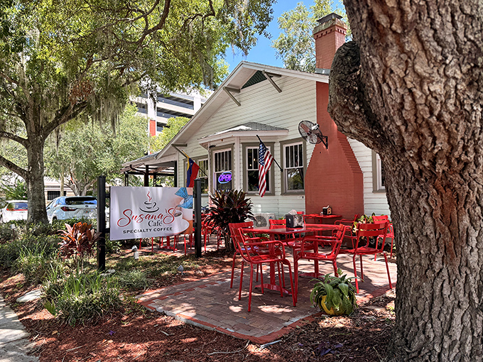 This bright white bungalow, dressed in bold red patio furniture, all but shouts &lsquo;pull up a chair!&rsquo;&mdash;Susana&rsquo;s exterior is pure Florida-casual charm.