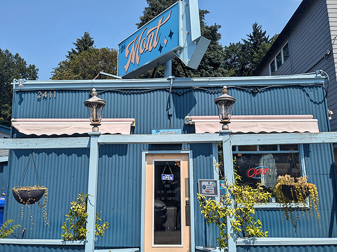 The Mont's vibrant blue exterior isn't just a building&mdash;it's a promise of good things to come, standing like a delicious beacon on Belmont Street.