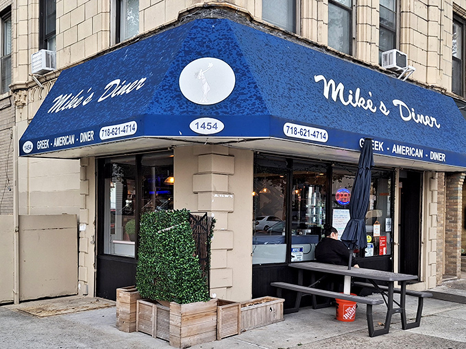 That iconic blue awning marks the spot where Brooklyn's breakfast dreams come true&mdash;no frills, just perfect pancakes waiting inside.