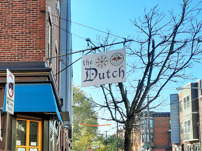 The iconic blue-and-white striped awning and simple hanging sign announce The Dutch without fanfare &ndash; like a secret handshake for breakfast aficionados.