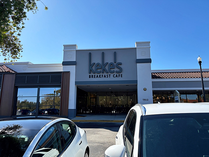 Keke's bold blue signage stands out against Florida's cloudless sky, like a beacon calling breakfast enthusiasts home to their morning sanctuary.