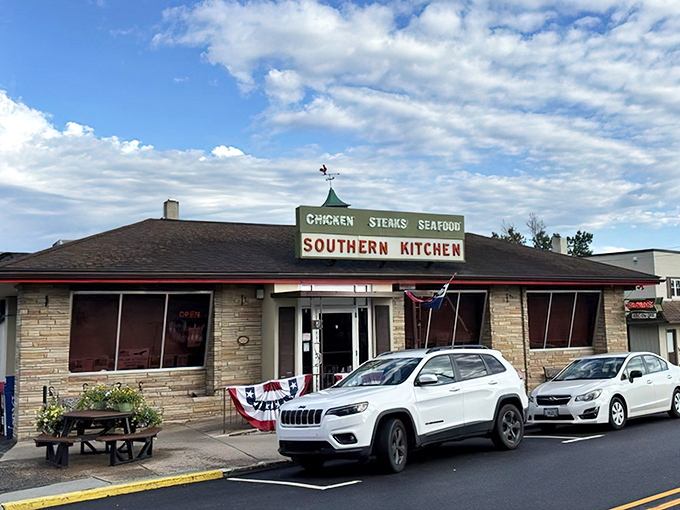 The stone facade of Southern Kitchen stands proudly against Virginia's blue skies, a beacon of comfort food that's been calling hungry travelers home for generations.