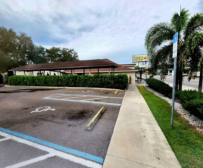 The iconic Trip's Diner exterior beckons with its promise of "BREAKFAST ALL DAY" – four words that might be the most beautiful in the English language.