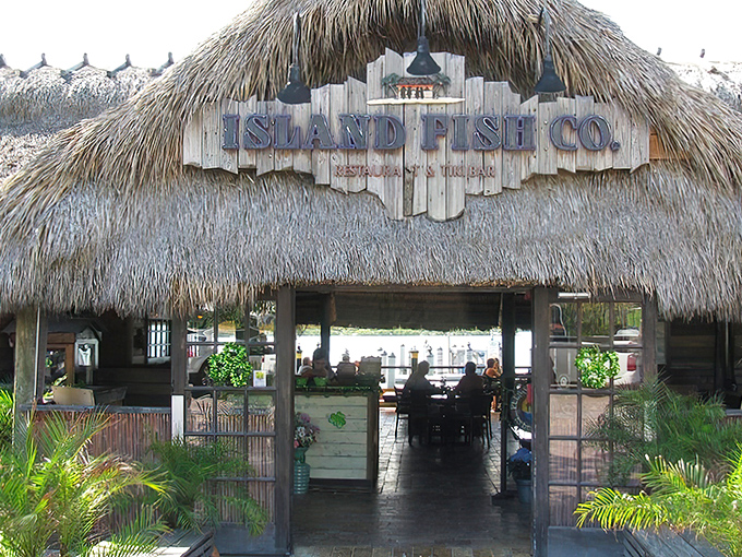 Step into paradise! The Island Fish Co.'s authentic tiki hut entrance sets the perfect tone for the Florida Keys experience that awaits inside.
