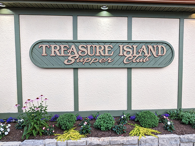 The iconic Treasure Island Supper Club sign welcomes hungry pilgrims to this Moraine landmark where time stands deliciously still.