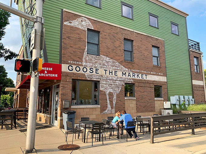 The unmistakable green building with its bold red awning stands like a culinary lighthouse at the corner of 25th Street, beckoning sandwich enthusiasts from miles around.