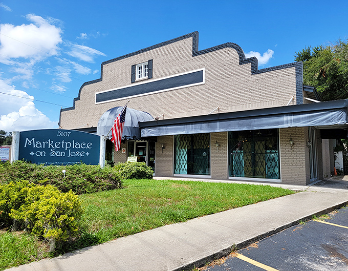 The stately brick fa&ccedil;ade of Marketplace on San Jose stands like a time portal disguised as architecture, beckoning treasure hunters with patriotic flair.