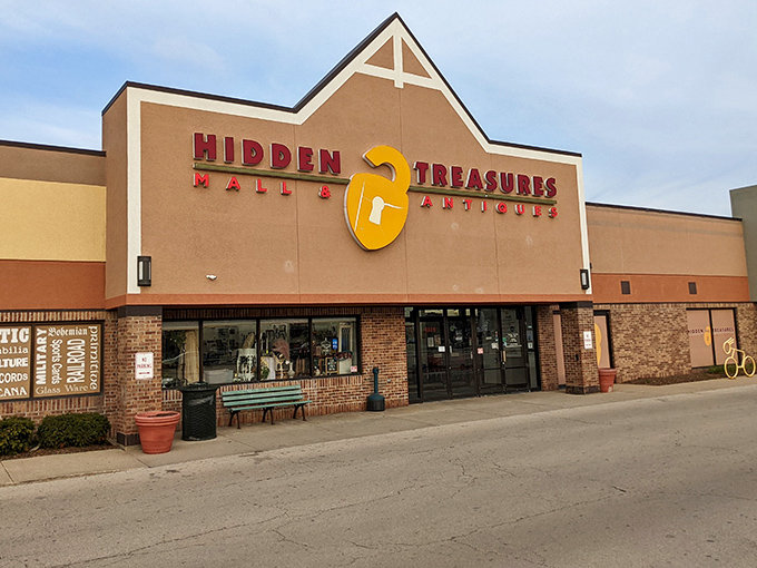 The iconic yellow padlock logo of Hidden Treasures Mall & Antiques beckons bargain hunters with the promise of affordable nostalgia inside.