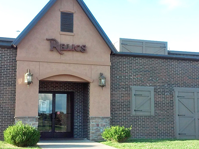 The stucco-and-brick fa&ccedil;ade of Relics stands like a fortress guarding treasures within. Those lantern sconces aren't just for show&mdash;they're beacons for bargain hunters.