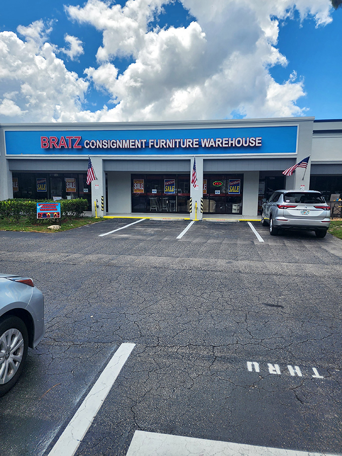 The bright blue sign against Florida's cloud-dotted sky promises treasure hunting that doesn't require a metal detector or wet suit—just comfortable shoes and an eye for bargains.