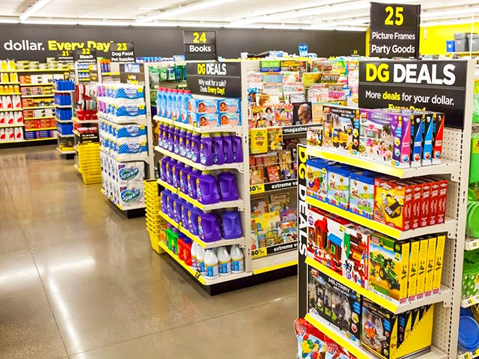 The iconic yellow sign beckons like a budget-friendly lighthouse, guiding savvy shoppers to this surprisingly well-stocked Dollar General in House Springs.