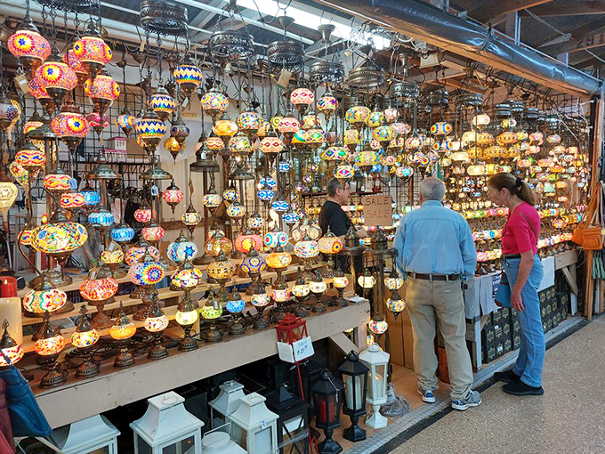 A kaleidoscope of mosaic lamps transforms an ordinary market stall into an Arabian Nights fantasy. Aladdin would upgrade his cave immediately.