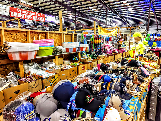 A treasure hunter's paradise awaits under the "Welcome to Brightleaf Market" sign, where colorful plastic tubs sit alongside endless rows of caps and trinkets.